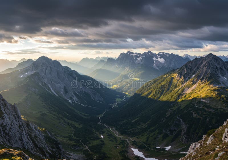 A Mesmerizing View of the Alps Mountain Range with Sunlight Piercing ...
