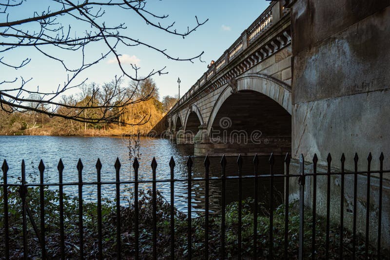 Mesmerizing View of the Bridge with Stone Arches Over the River Behind ...