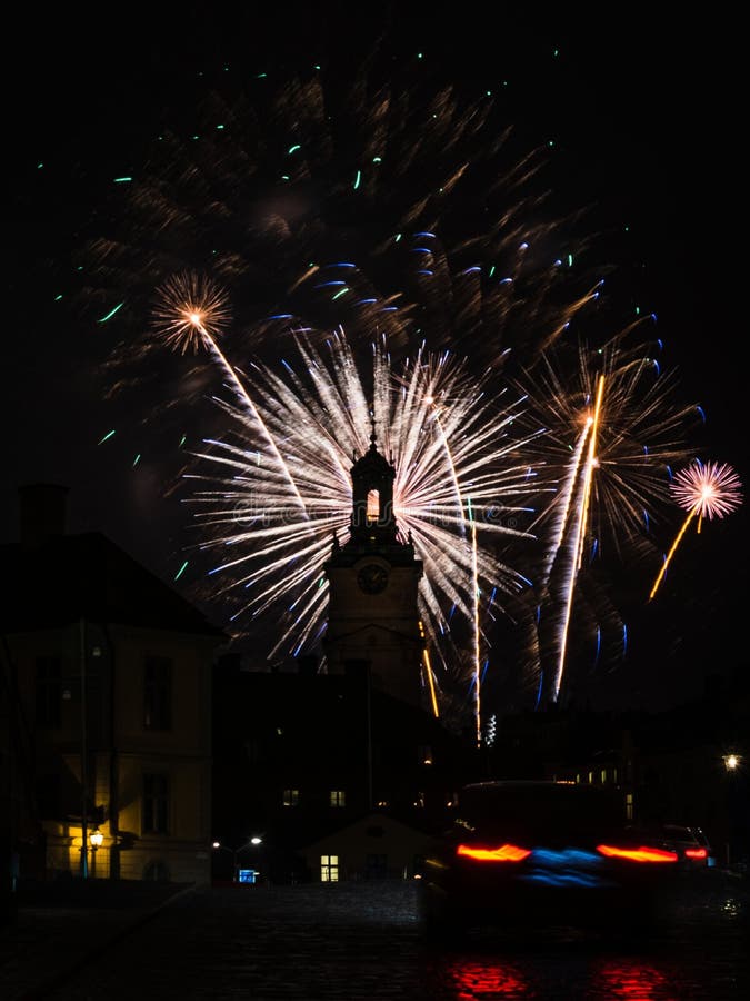 Mesmerizing View of the Colorful Fireworks Behind the Buildings at ...