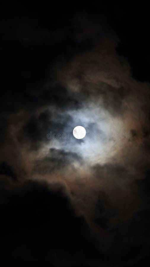 Mesmerizing View of a Full Moon with Clouds at Night Stock Image ...