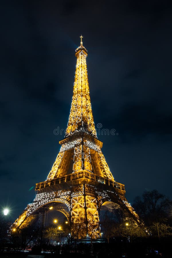 Mesmerizing View of an Illuminated Eiffel Tower at Late Night in Paris ... Mesmerizing View of an Illuminated Eiffel Tower at Late Night in Paris ...