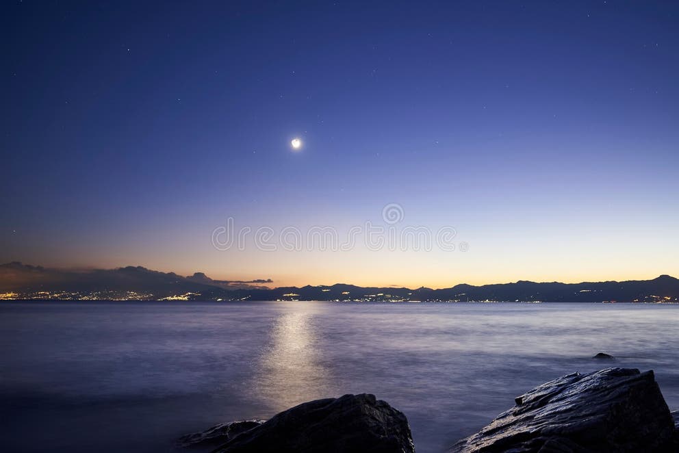 Mesmerizing View of a Lake with the Reflection of the Full Moon Stock ...