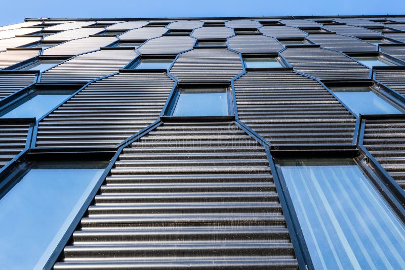 Mesmerizing View of a Skyscraper Against the Blue Sky Stock Photo ...