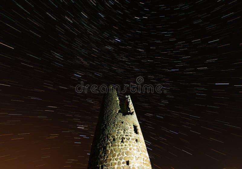 Mesmerizing View of the Starry Sky Over the Ancient Tower Ruins Stock ...