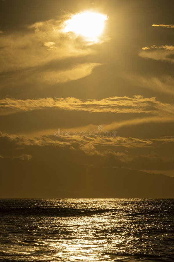 Mesmerizing View of the Sunlight Reflecting on the Waves of the Ocean ...