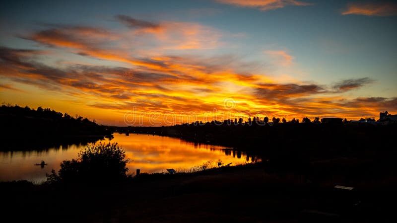 Mesmerizing View of a Sunset with a Cloudy Sky Over the Missouri River ...