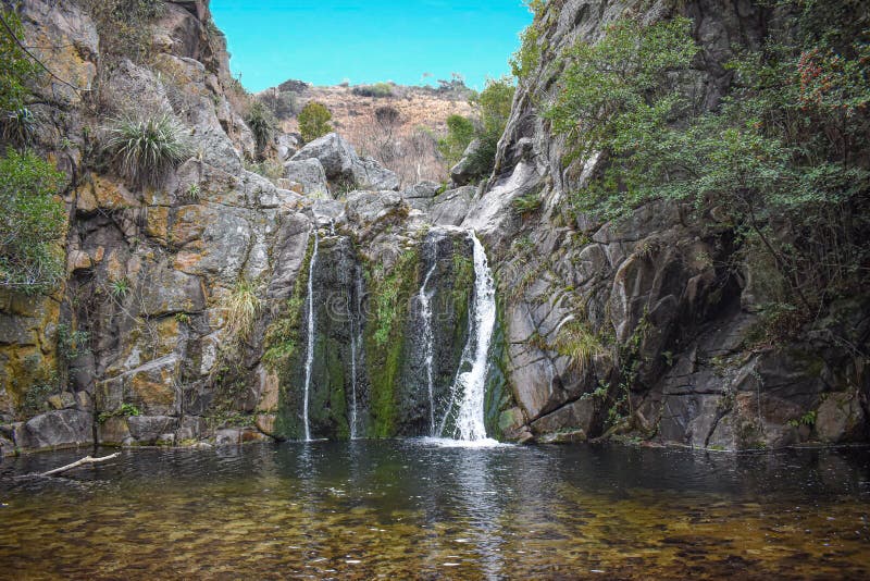 Mesmerizing Waterfall Hidden between Rocks Stock Image - Image of river ...