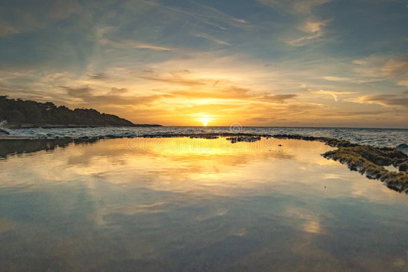 Mesmerzing Coastal View of the Sunser and Its Reflection Stock Image ...