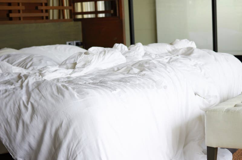 Mess Bed Sheet in the Room of Hotel Stock Image - Image of comforter ...