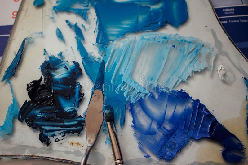 Mess of blue paints stock image. Image of paints, paintbrush - 65043861