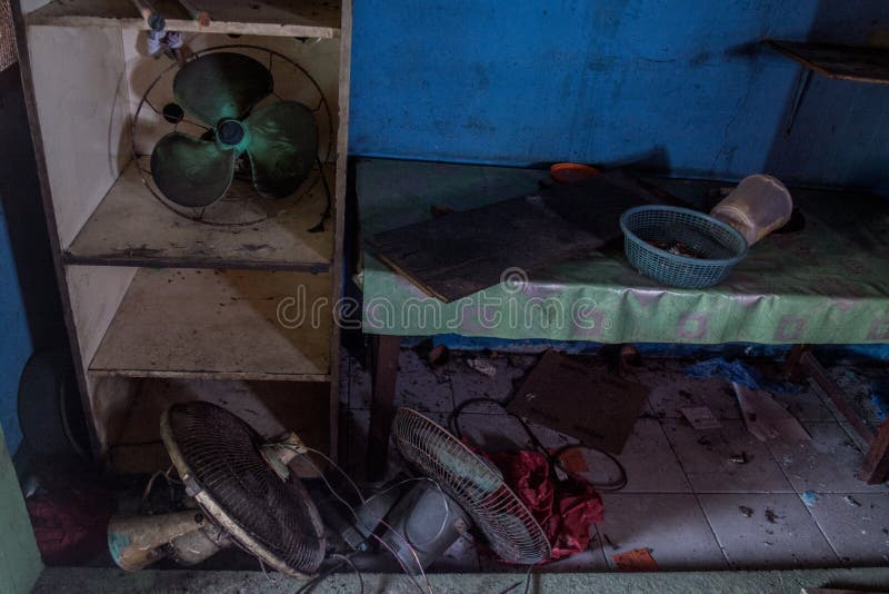 Mess and Broken Fans in the Abandoned Burned Down House Stock Photo ...