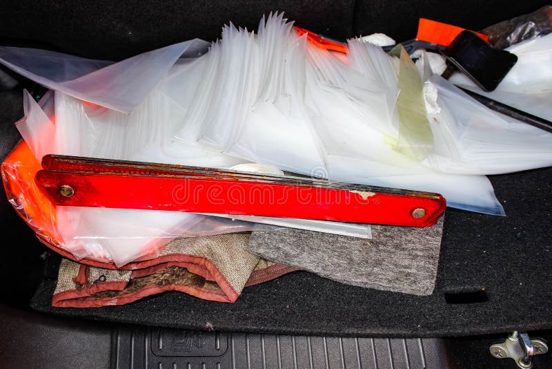 A Mess of Different Things in the Trunk of a Car Stock Image - Image of ...
