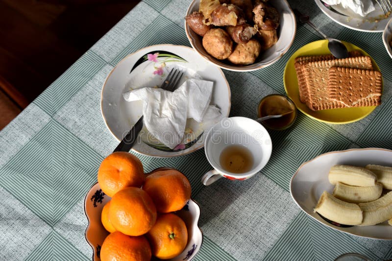 A Mess of Dishes on the Table after Dinner. Stock Photo - Image of ...