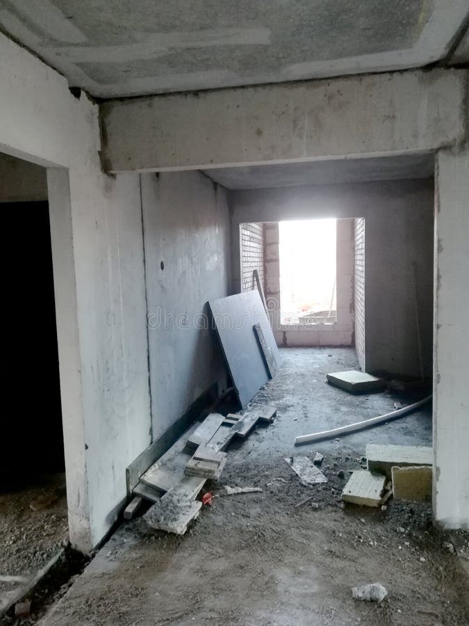 A Mess at a Construction Site with Scattered Building Materials and ...