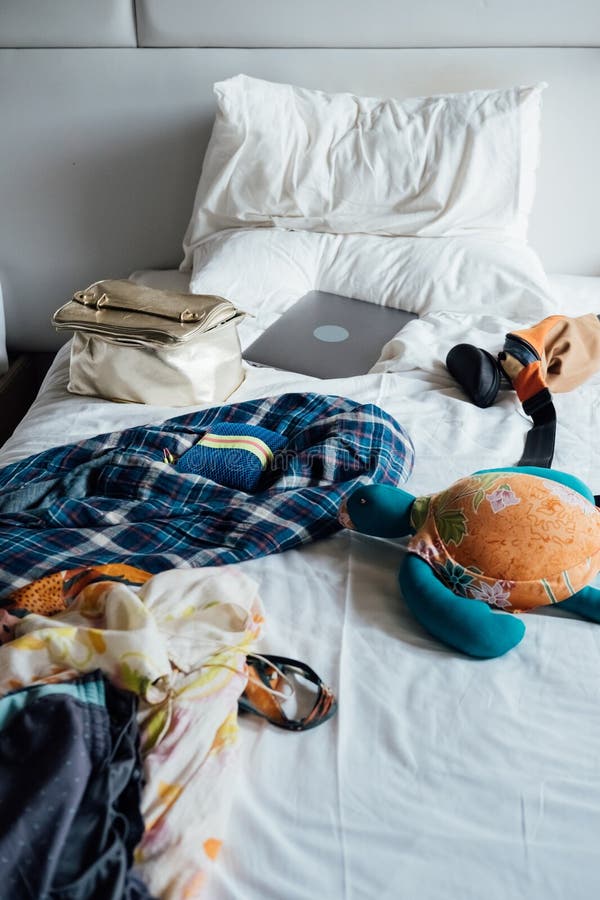 Mess in the Room. Women S Clothing, Computer on the Bed Stock Image ...