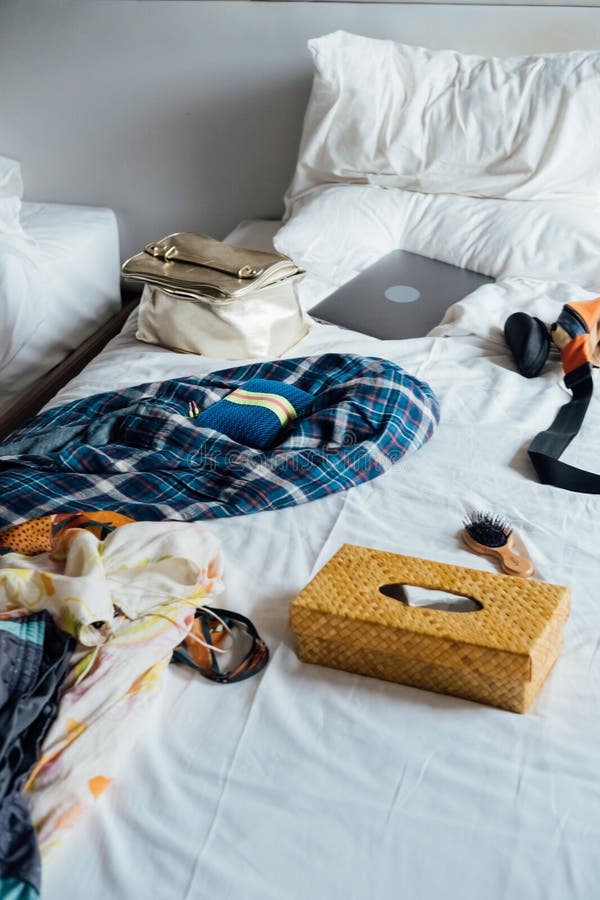 Mess in the Room. Women S Clothing, Computer on the Bed Stock Image ...