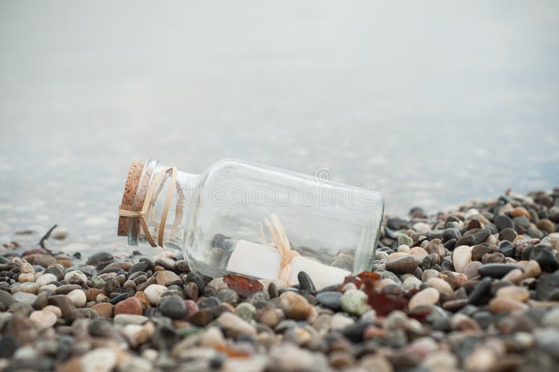 Message in a Bottle on the Beach Stock Photo - Image of paper ...