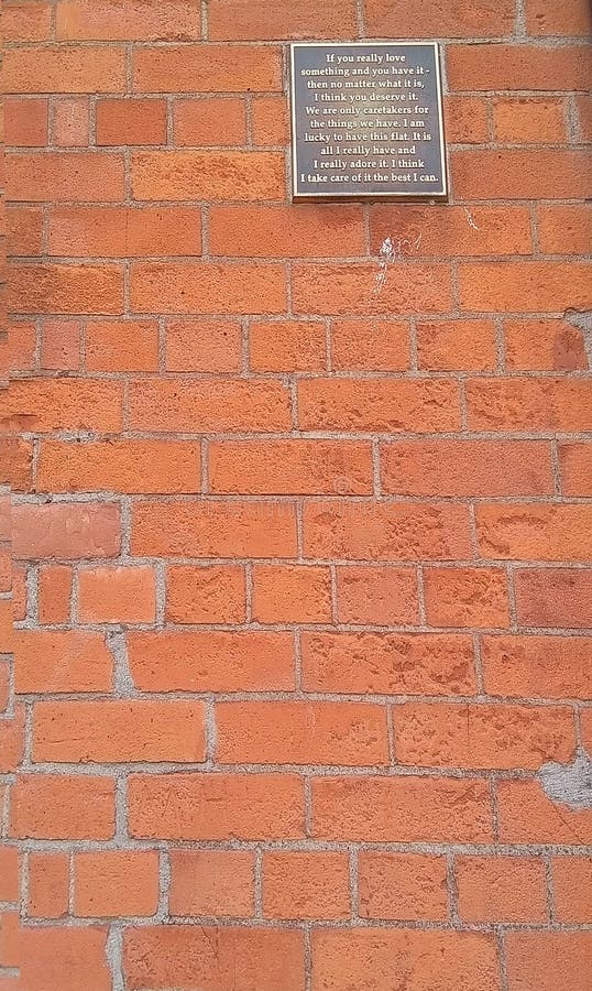 A Message of Joy on a Brick Wall Stock Image - Image of author ...