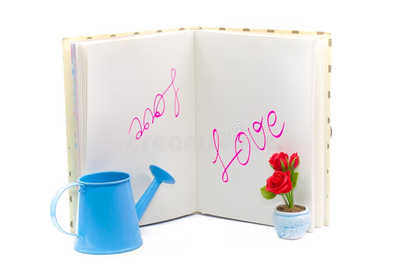 Message Love Spelled in Diary Book with Red Rose and Watering Ca Stock ...