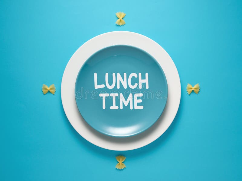 The Message Lunch Time Written on a Blue Plate Designed As a Clock ...