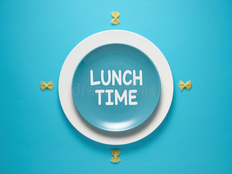 The Message Lunch Time Written on a Blue Plate Designed As a Clock ...