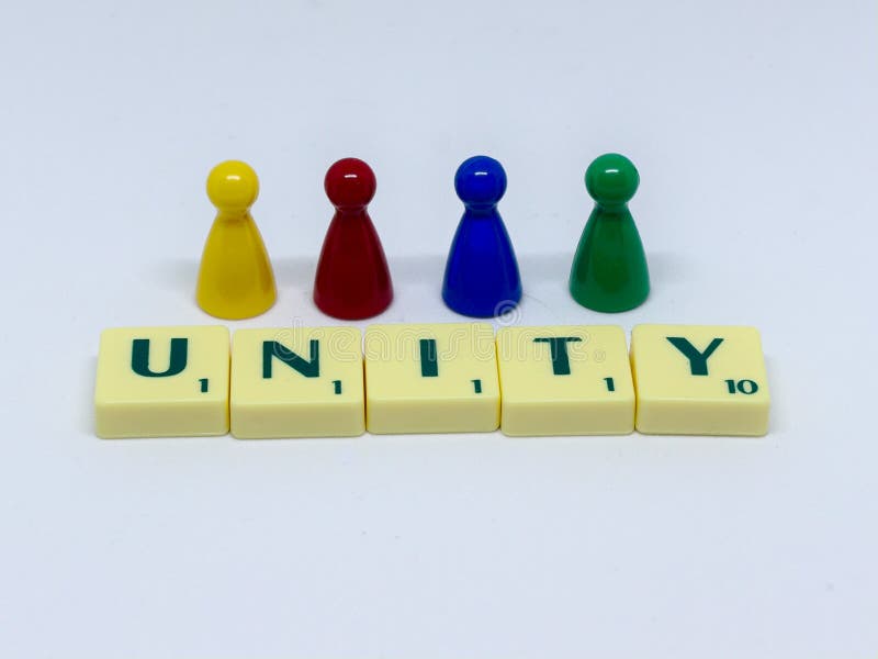 Unity in Alphabet Letters and Playing Pieces from Board Games Stock ...