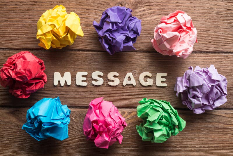 Message Word and Colorful Crampled Paper Ball Placed in Circle on ...