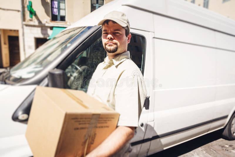 Messenger Delivering Parcel, Standing Next To His Van Stock Image ...