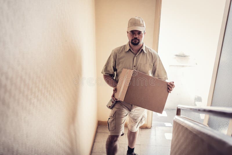 Messenger Delivering Parcel, Standing Next To His Van Stock Image ...