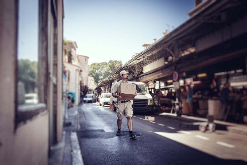 Messenger Delivering Parcel Stock Photo - Image of expertise, european ...