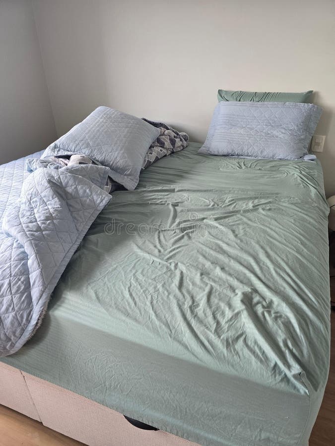 Messy bed stock photo. Image of mattress, bedroom, silver - 352885702