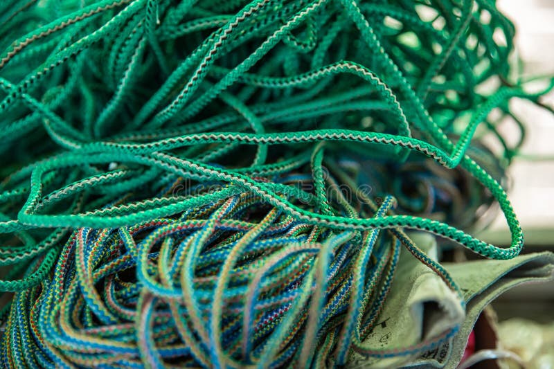 Close-up of Tangled Green Cord or Rope, Concept of Organization ...
