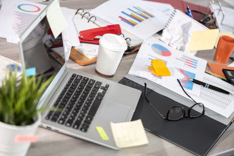 Messy and cluttered desk stock photo. Image of overwhelmed - 192153918
