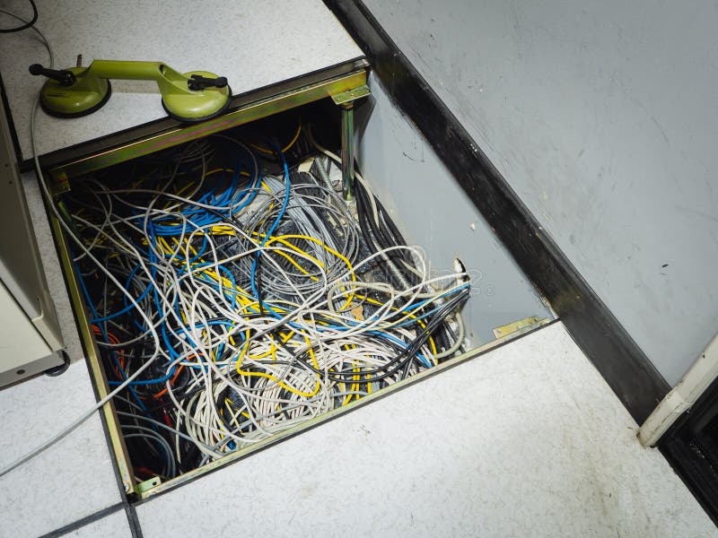 Messy Data Cables Under the Floor Inside the Data Storage Room Stock ...