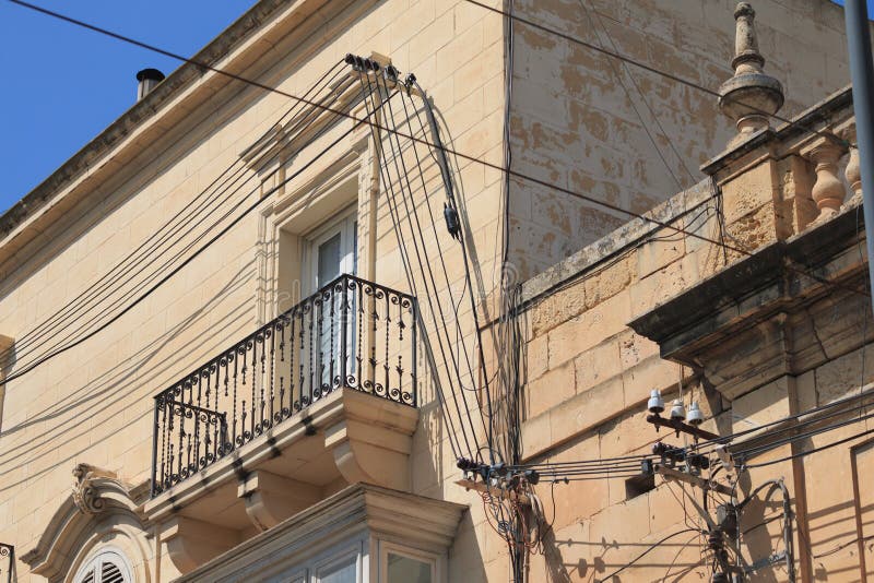 Messy Electrical Cables on Wall Corner in Malta Stock Photo - Image of ...