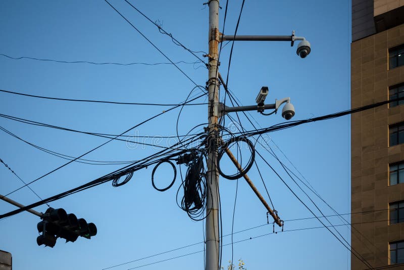 Messy Electricity Cable Pole, Blue Sky in the Background. High Voltage ...