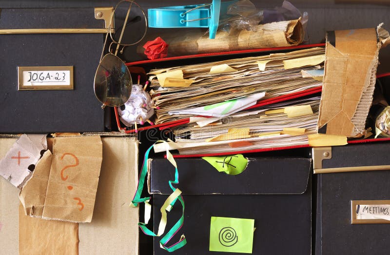 Messy File Folders And Storage Boxes In A Cluttered Office Bookshelfred Tape Bureaucracy