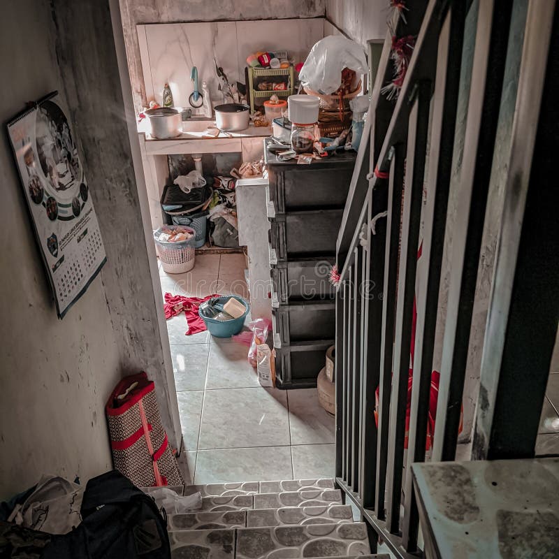 Messy Kitchen Seen from the Top of the Stairs Stock Photo - Image of ...