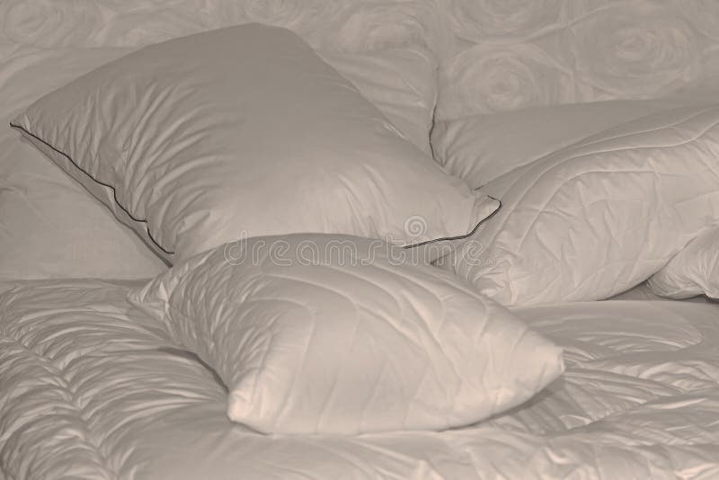 Messy pillows inside bed stock photo. Image of comfortable - 151769908