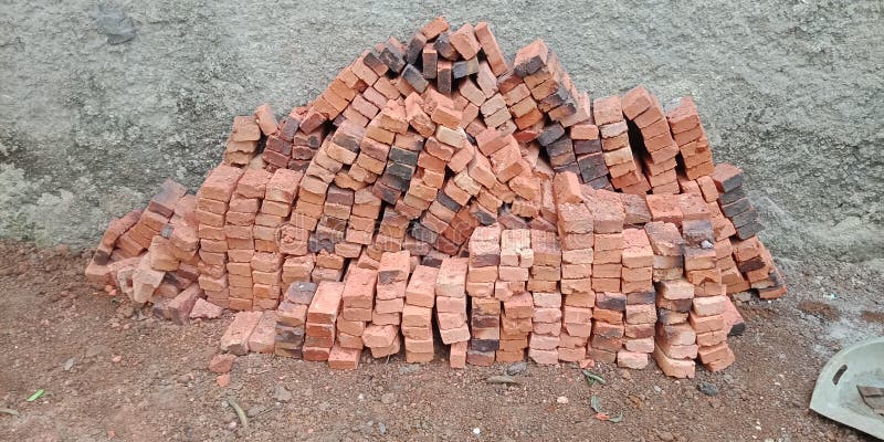 Messy Red Bricks on the Sandy Ground Stock Photo - Image of sandy ...