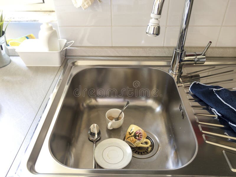 Messy Sink in Domestic Kitchen with Dirty Crockery Stock Image - Image ...