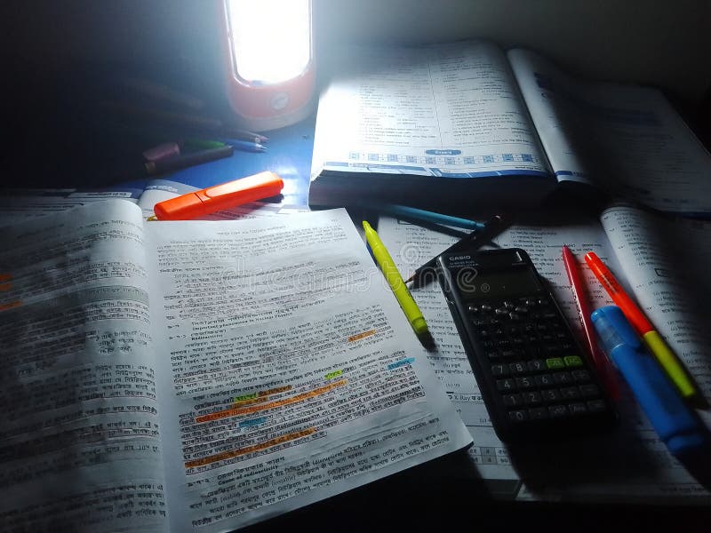Messy Study Table with Books, Color Pens, Light and Calculator Stock ...