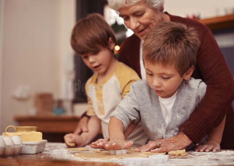 Messy but Tasty. Cropped Shot of Two Young Brothers Baking in the ...