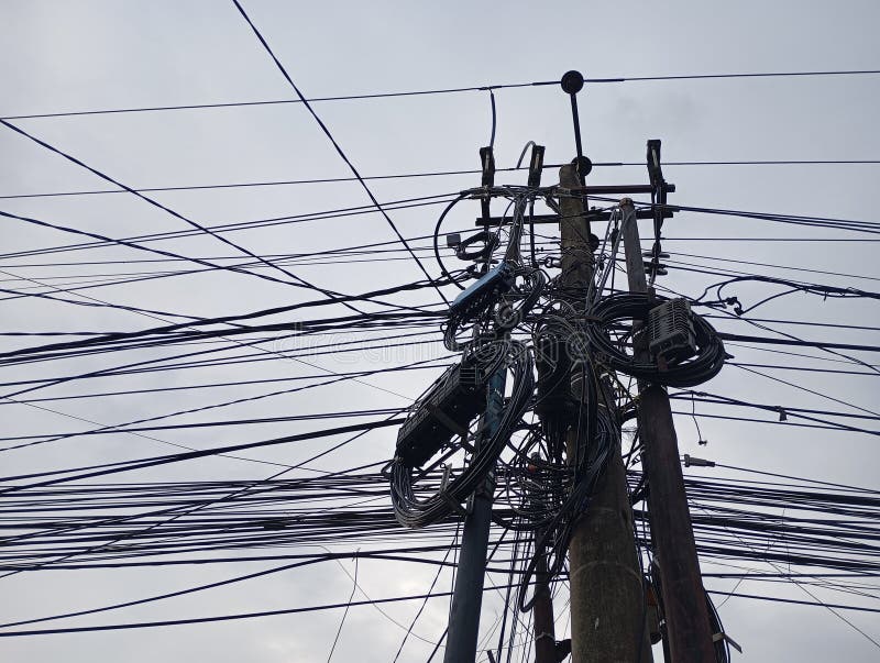 Messy Telephone and Electrical Cable Installation Stock Image - Image ...