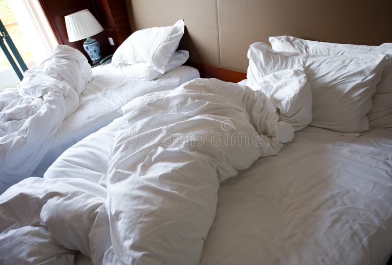 Messy unmade bed stock photo. Image of pillows, inside - 17177112