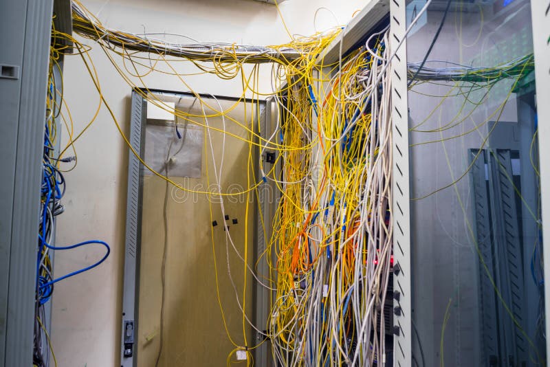 Messy Yellow Optic Cables are Randomly Entangled with Each Other Server ...