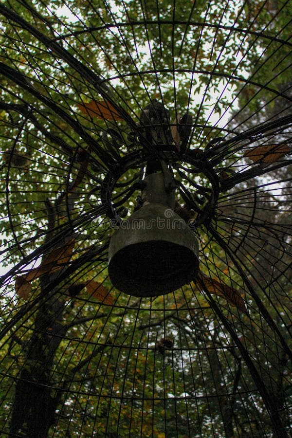 Metal Arch with Bell in the Top. Autumn Forest on the Background Stock ...