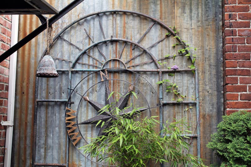Metal Arch Decorated with a Compass Rose Stock Photo - Image of plants ...