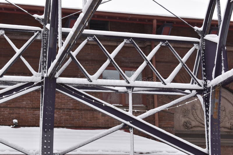 Metal Archway Bars in the Snow Stock Photo - Image of bridge, modern ...