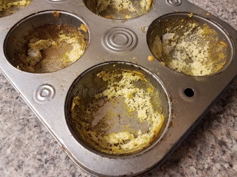 Metal Baking Tray Cups or Container with Leftover Egg Stock Photo ...